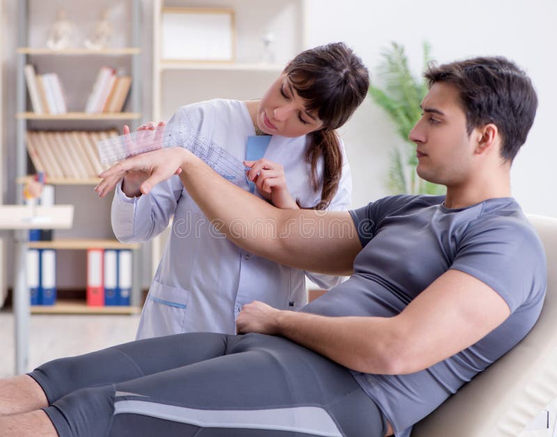 Doctor Checking Patients Joint Flexibility with Gonimeter Stock Photo ...