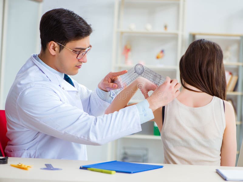 Doctor Checking Patients Joint Flexibility with Gonimeter Stock Photo ...