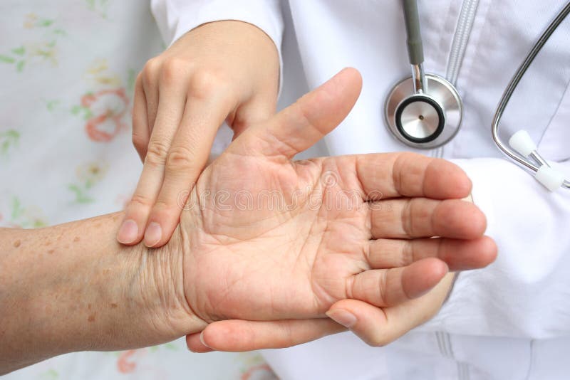 Doctor checking pulse stock photo. Image of home, health - 15094712