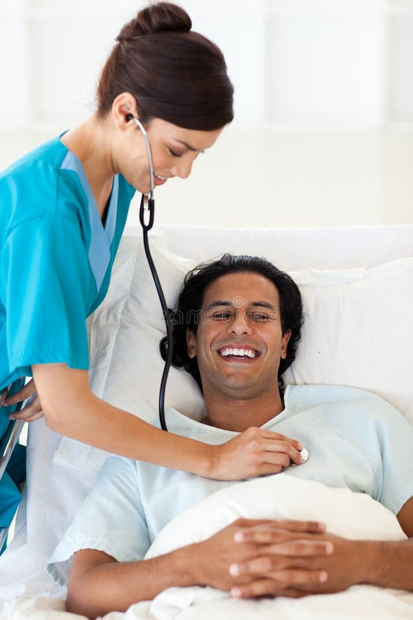 Doctor Checking the Pulse of a Patient Stock Photo - Image of clinic ...