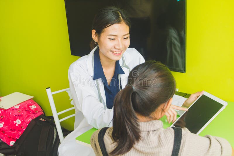 Doctor is Checking the Pulse of the Patient Kid Stock Image - Image of ...