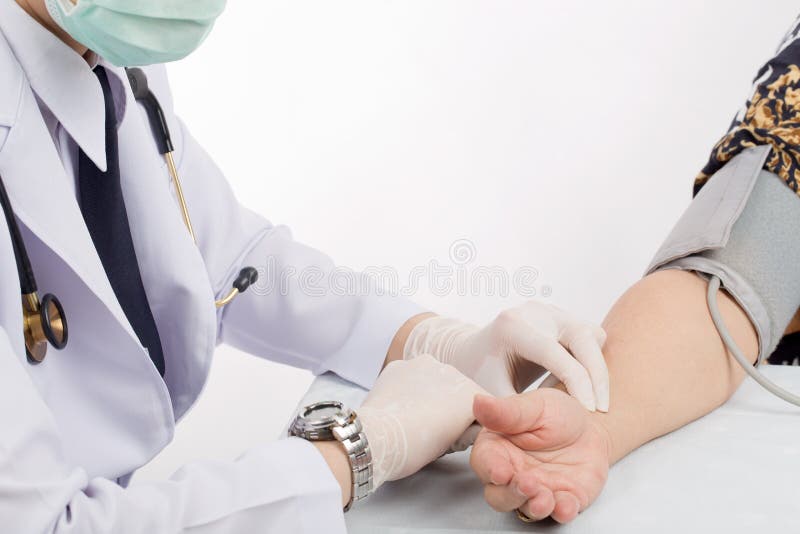 Doctor Checking Pulse of Patient with Stethoscope on Table Isol Stock ...