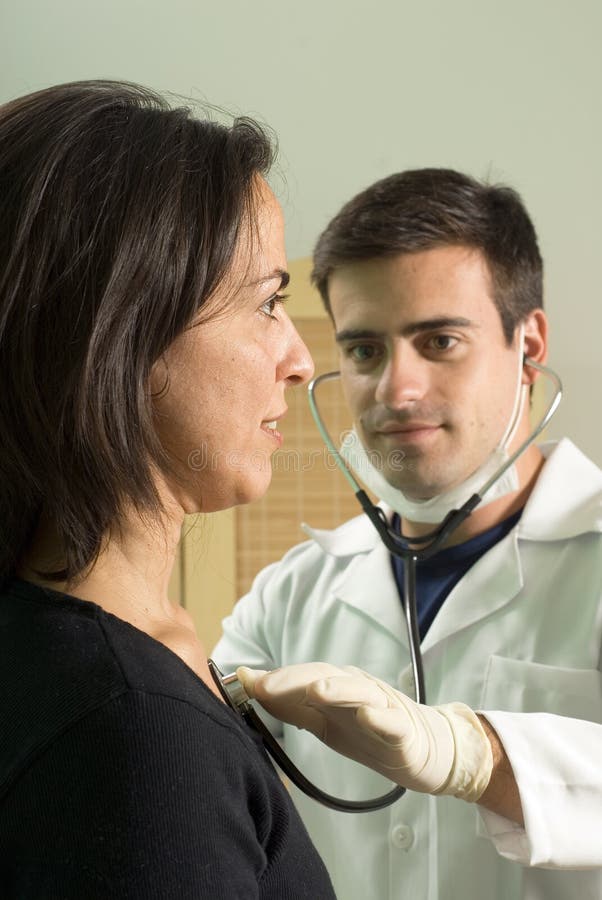Doctor Checking Pulse - Vertical Stock Photo - Image of race, medical ...
