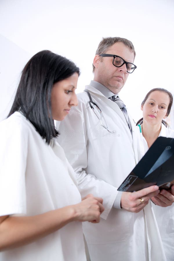Doctor Checking X-ray Image Stock Photo - Image of person, laboratory ...