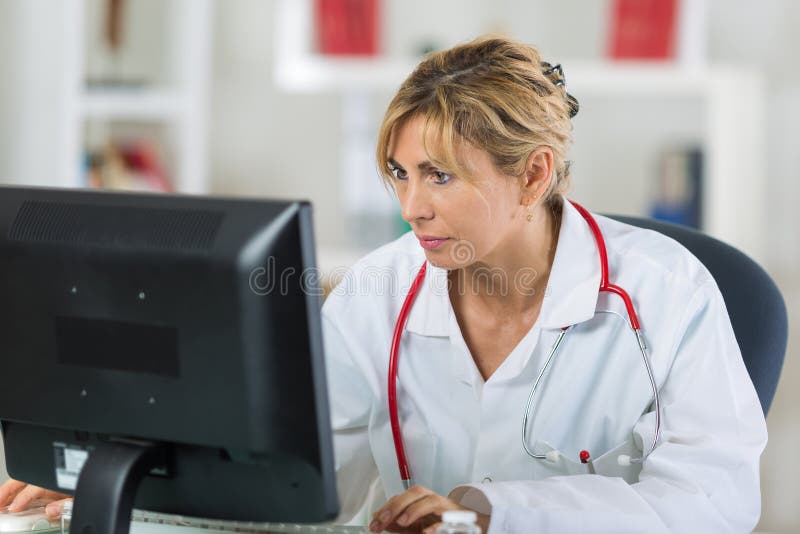 Doctor Checking Results on Computer Stock Photo - Image of checking ...