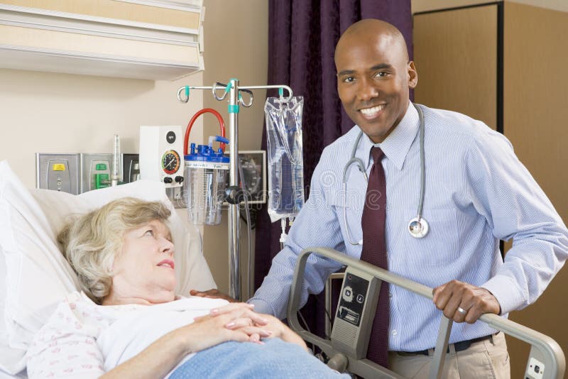 Doctor Checking Up on Patient in Hospital Stock Image - Image of doctor ...