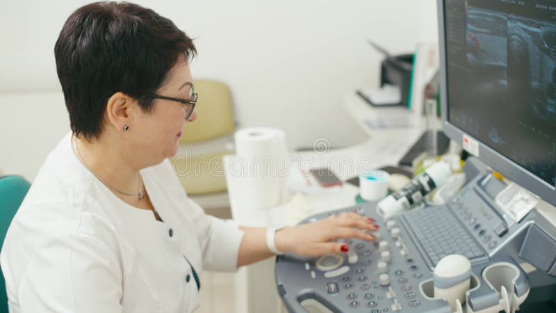 The Doctor Checks the Normal Parameters on the Ultrasound Diagnostic ...