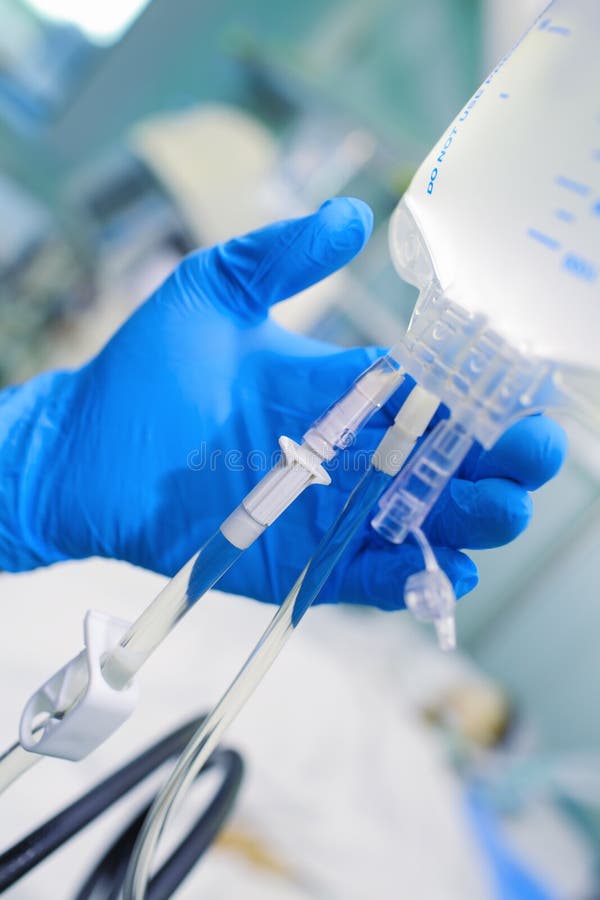 Doctor Checks Up the Intravenous Drip System Stock Image - Image of ...