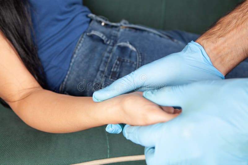 The Doctor Checks the Woman S Pulse Stock Photo - Image of heartbeat ...
