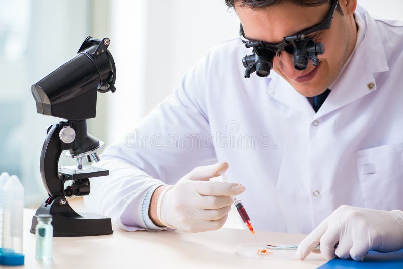 The Doctor Chemist Working on Blood Samples in Lab Stock Photo - Image ...
