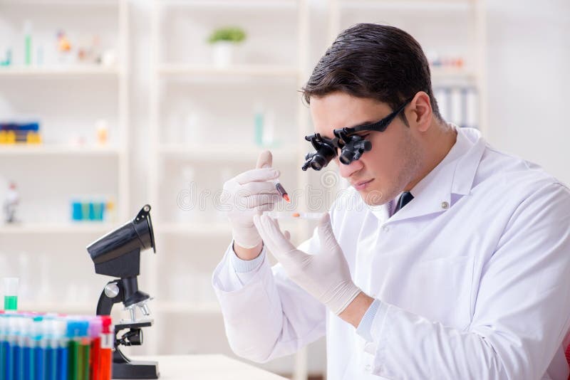 The Doctor Chemist Working on Blood Samples in Lab Stock Photo - Image ...