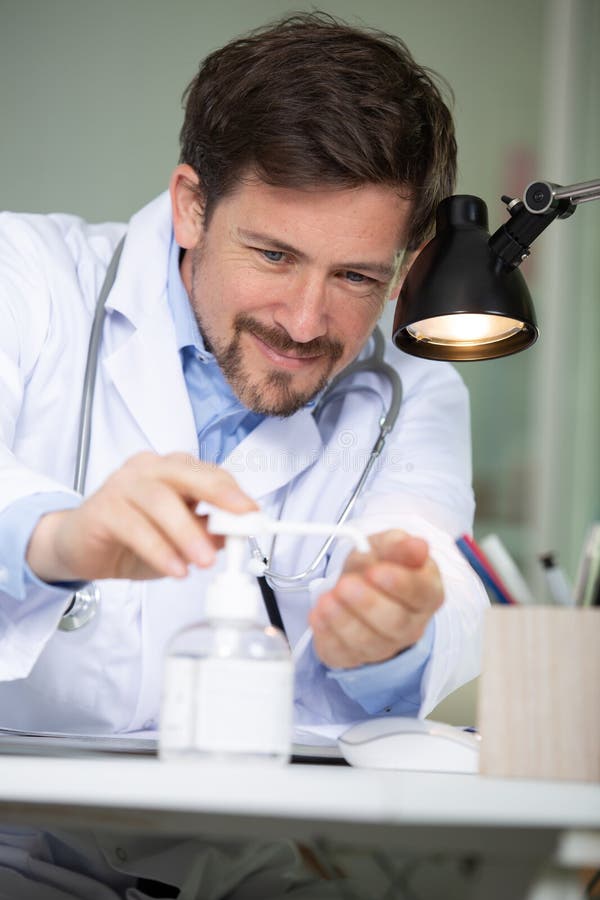 Doctor cleaning hands stock image. Image of sink, medicare - 234518735
