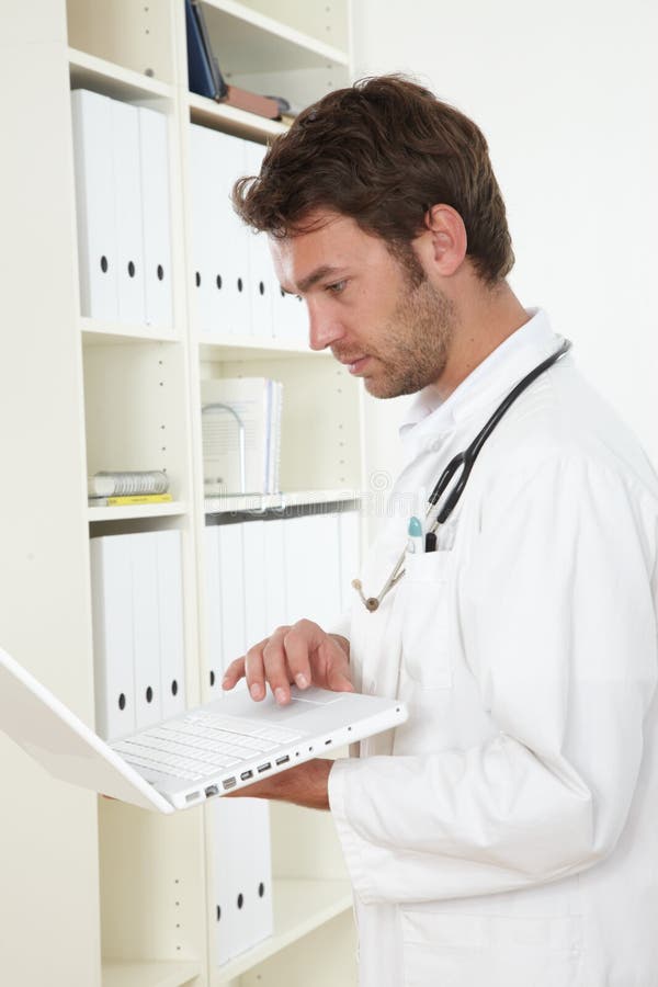 Doctor in clinic stock photo. Image of health, table - 19301132