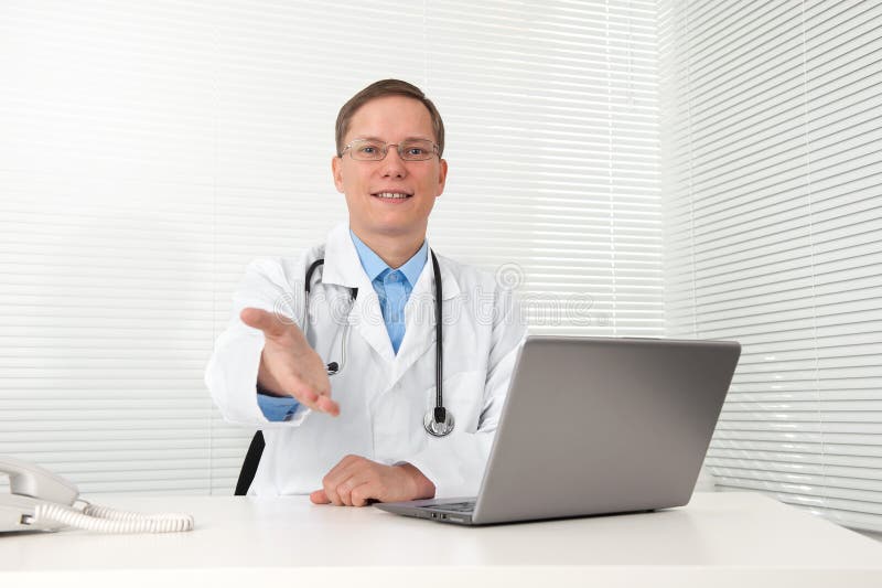 Doctor with a computer stock photo. Image of friendly - 26410348