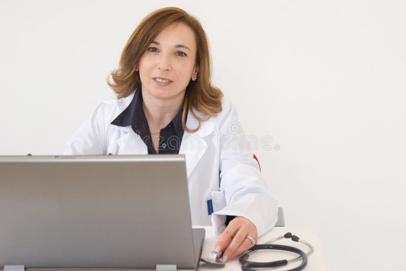 Doctor Using Computer Vertical Stock Image - Image of worried, male ...