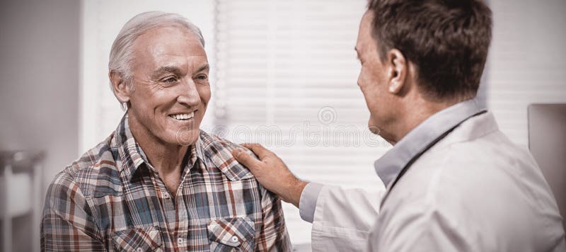 Doctor Consoling Senior Man Stock Photo - Image of looking ...