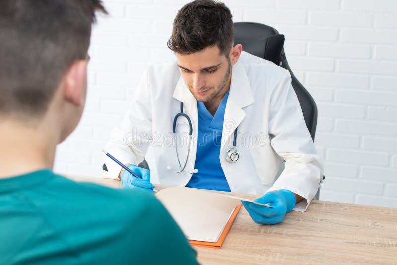 Doctor in Consultation with Patient Stock Photo - Image of people ...