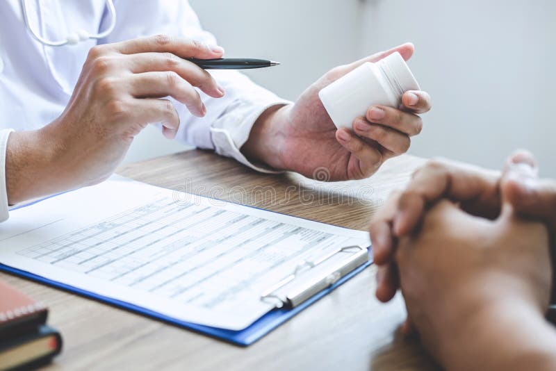 Doctor Consulting with Patient Examining for Patient, Presenting ...