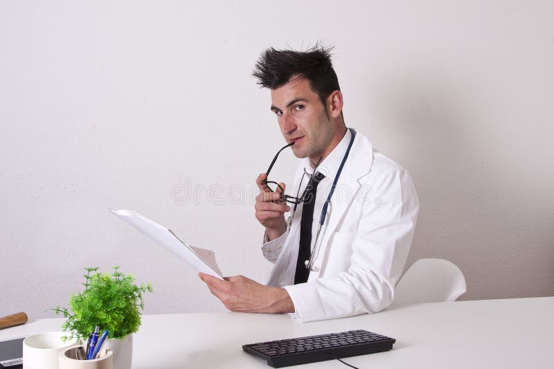 Doctor consulting reports stock image. Image of medicine - 55475667