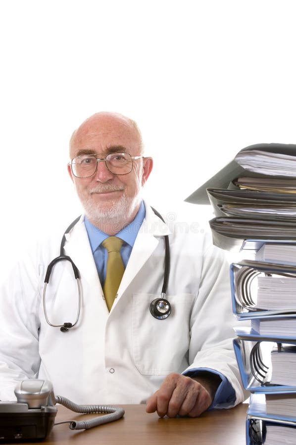 Doctor at desk stock image. Image of stethoscope, nurse - 15737749
