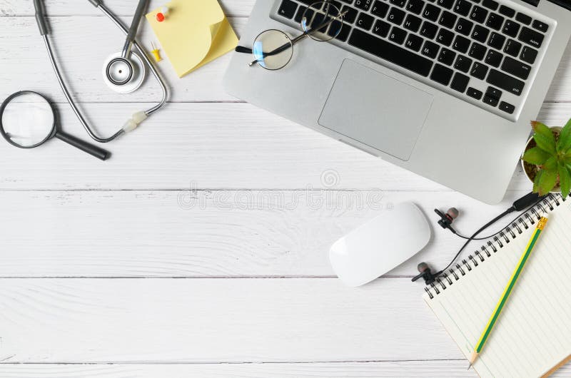 Doctor Desk Table with Stethoscope, Coffee, Medical Gown and Not Stock ...