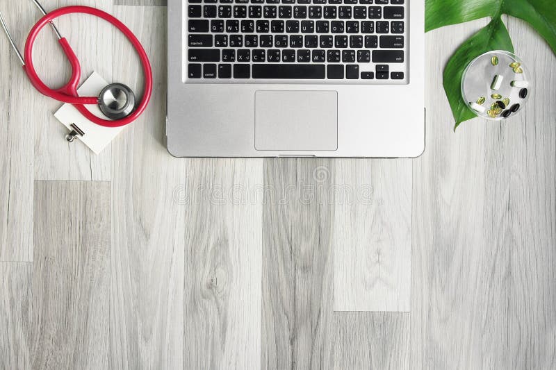 Doctor Desk Table with Stethoscope and Laptop Computer, Top View. Stock ...