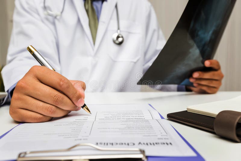 Doctor Diagnose and Analyze on X-ray Film of Patient Stock Photo ...