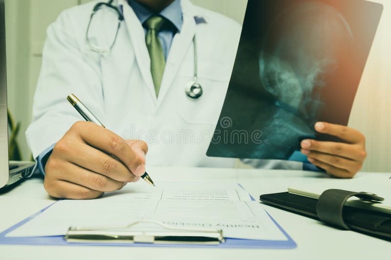 Doctor Diagnose and Analyze on X-ray Film of Patient Stock Photo ...