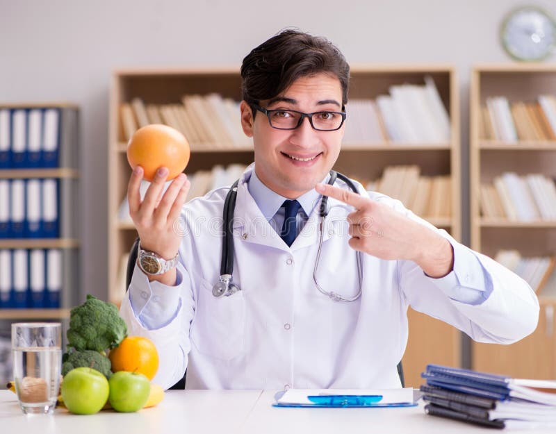 Doctor in Dieting Concept with Fruits and Vegetables Stock Image ...