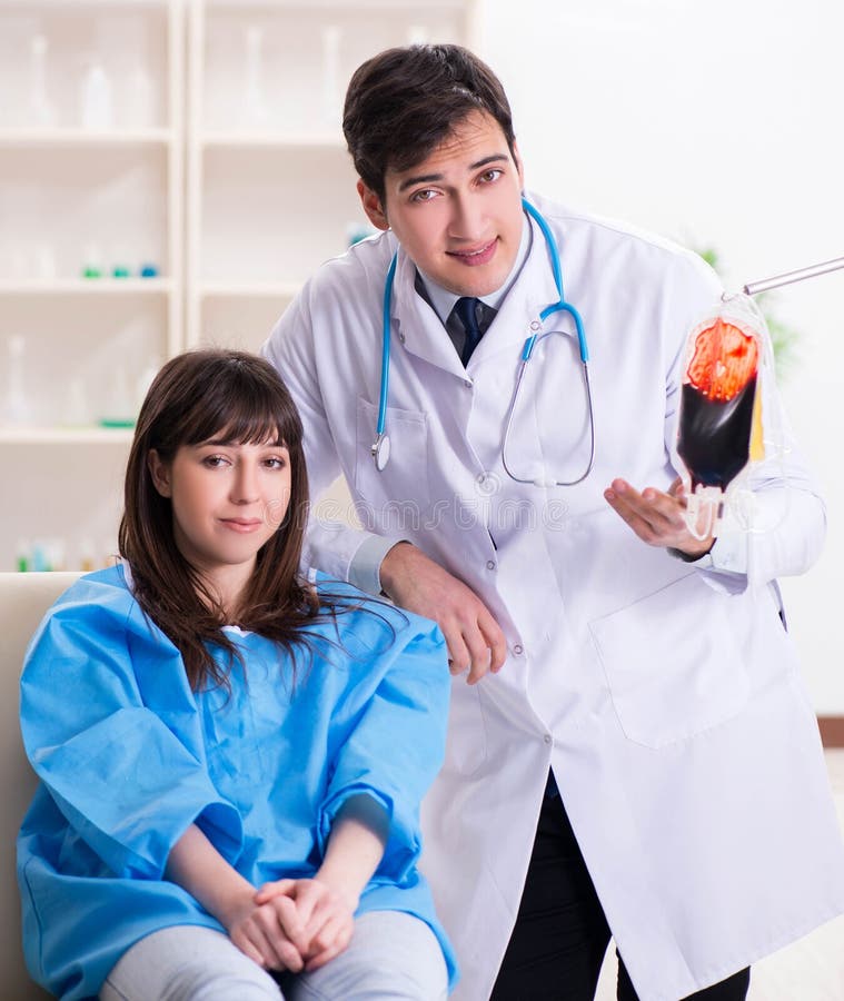 Doctor Discussing Blood Transfusion with Patient Stock Photo - Image of ...