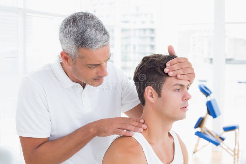 Chiropractor Doing Neck Adjustment Stock Image - Image of patient ...