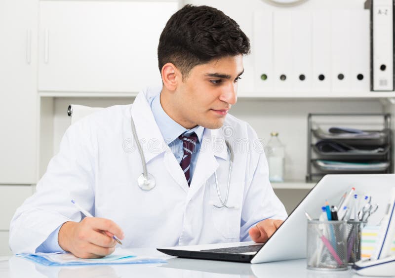 Doctor is Doing Report about Patients Stock Image - Image of smiling ...