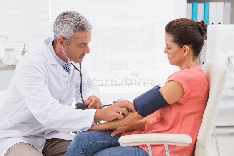 Doctor Doing Test at His Patient Stock Image - Image of sitting ...