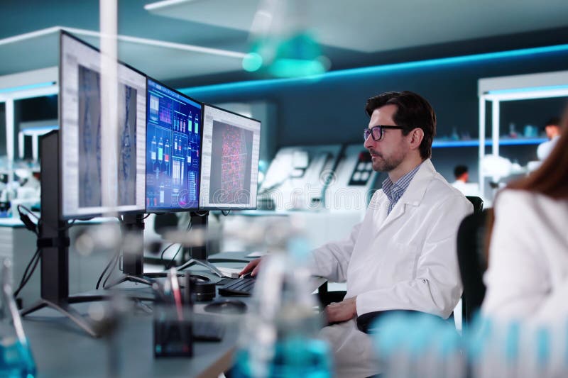 Doctor and Engineer Analyze Pharmaceutical Data Stock Photo - Image of ...