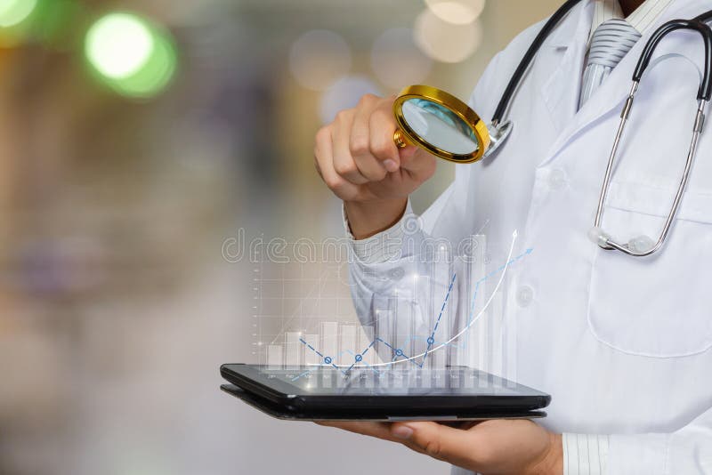 Doctor Examine Statistics Using a Magnifying Glass Stock Photo - Image ...
