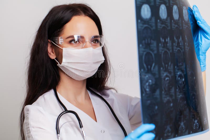 Doctor Examines an MRI Image of the Patient`s Brain Stock Image - Image ...