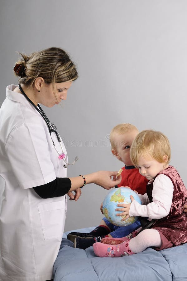 Doctor Examining Babies Picture. Image: 17274244