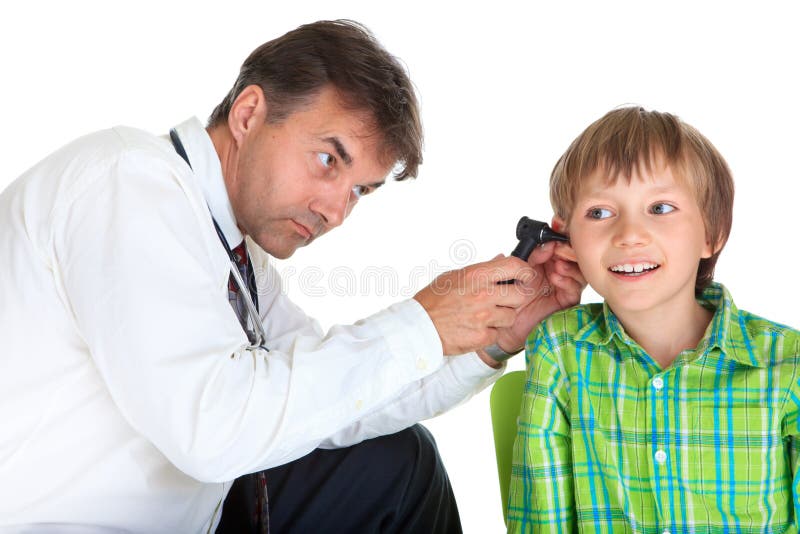 Doctor examining boy s ear stock image. Image of youth - 13926727