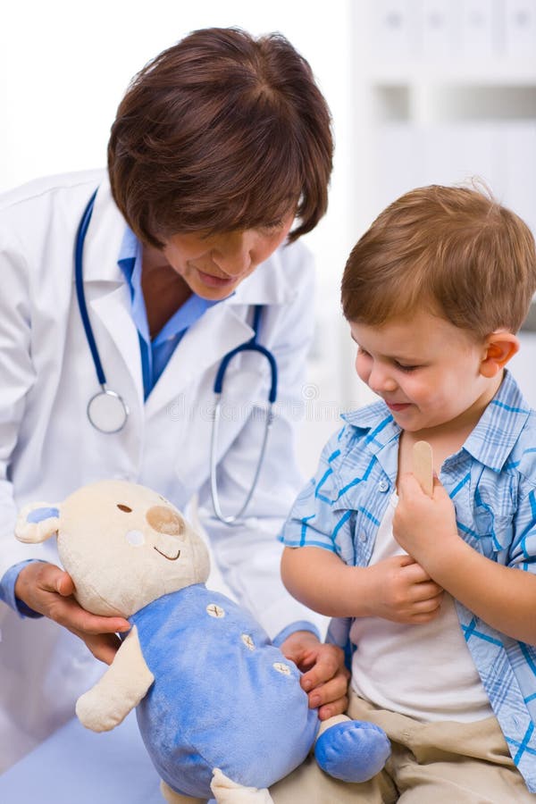 Doctor examining child stock image. Image of doctor, children - 7940835