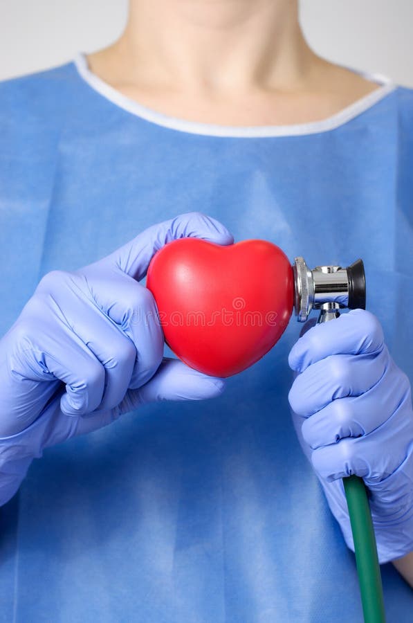 Heart in doctor s hand stock photo. Image of healthy - 31719062
