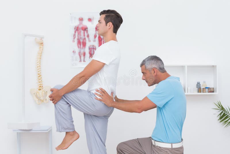Doctor Examining His Patient Back Stock Photo - Image of muscle ...