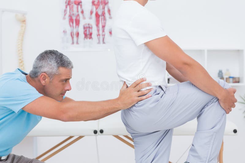Doctor Examining His Patient Back Stock Image - Image of male, indoors ...