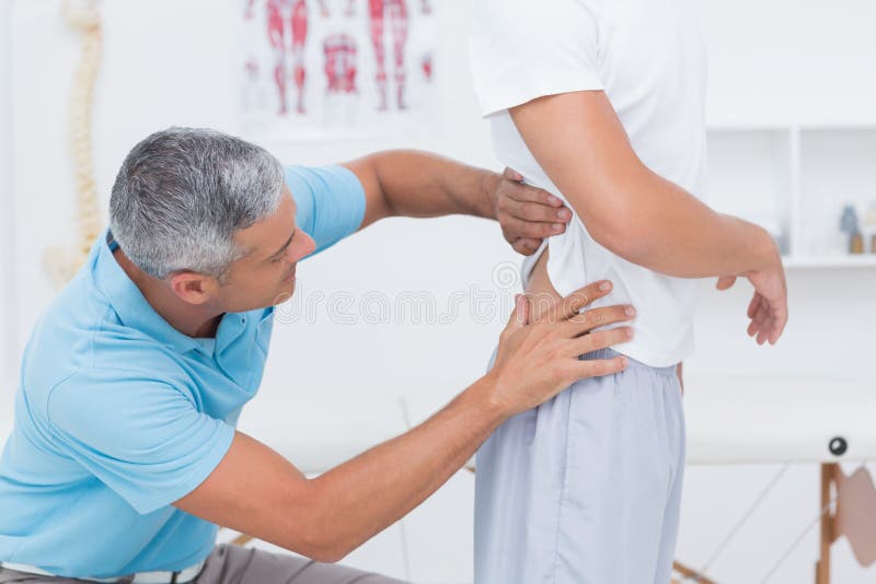 Doctor Examining His Patient Back Stock Image - Image of postural ...