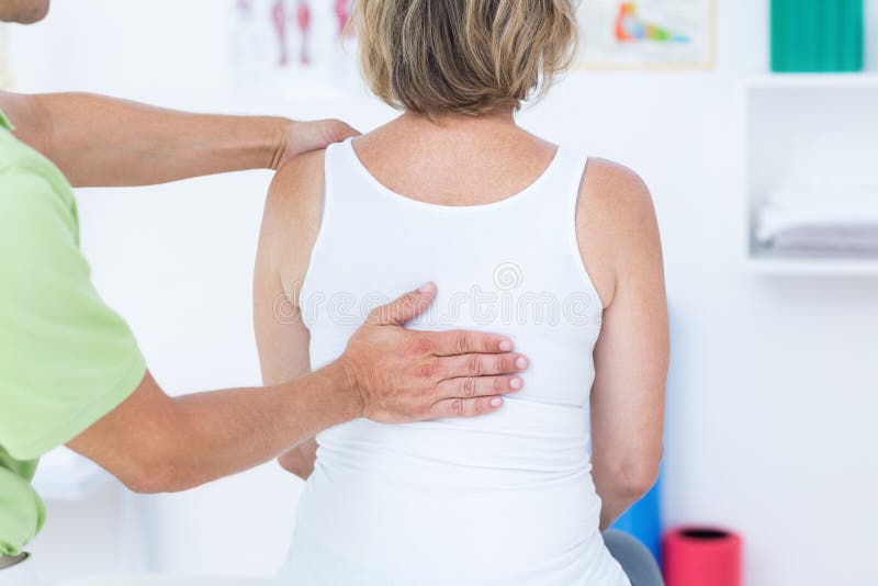 Doctor Examining His Patient Back Stock Photo - Image of exercise ...