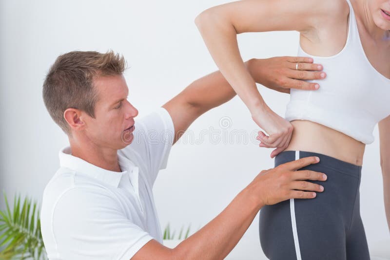Doctor Examining His Patient Back Stock Photo - Image of osteopath ...