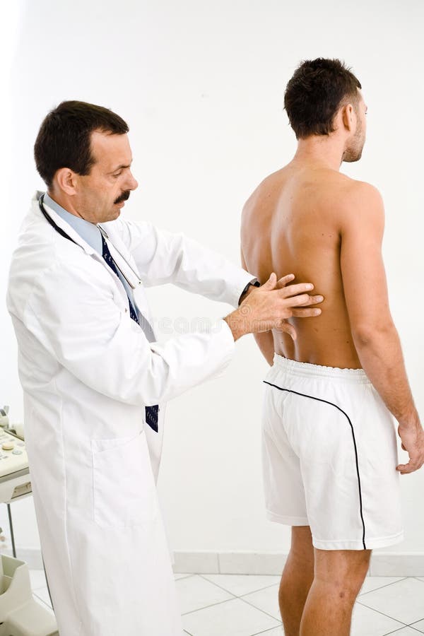 Doctor examining patient stock photo. Image of practitioner - 3073064