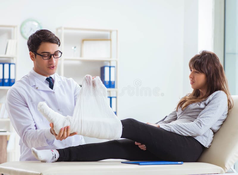 Doctor Examining Patient with Broken Leg Stock Image - Image of health ...