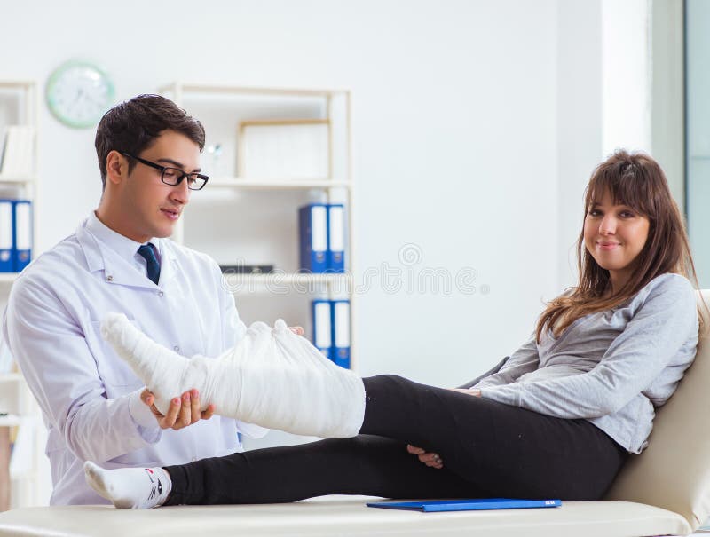 Doctor Examining Patient with Broken Leg Stock Image - Image of exam ...