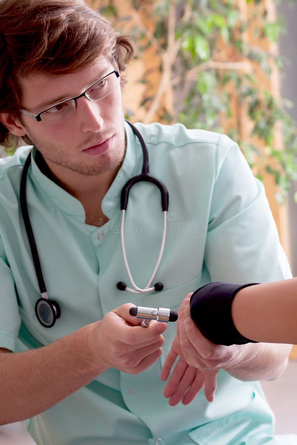 Doctor Examining Patient Pulse Stock Image - Image of clinic ...