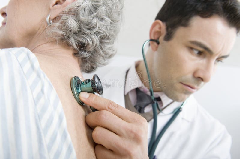 Doctor Examining Patient S Back Using Stethoscope Stock Photo - Image ...